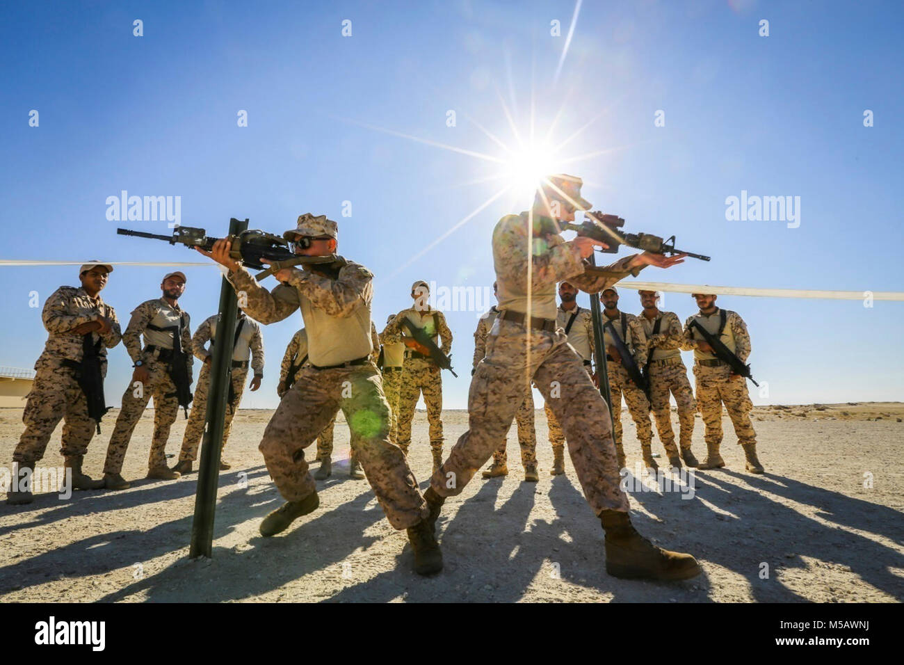 BAHRAIN (Jan. 14, 2018) U.S. Marine Corps Cpl. Kaler Bishop (right) and ...