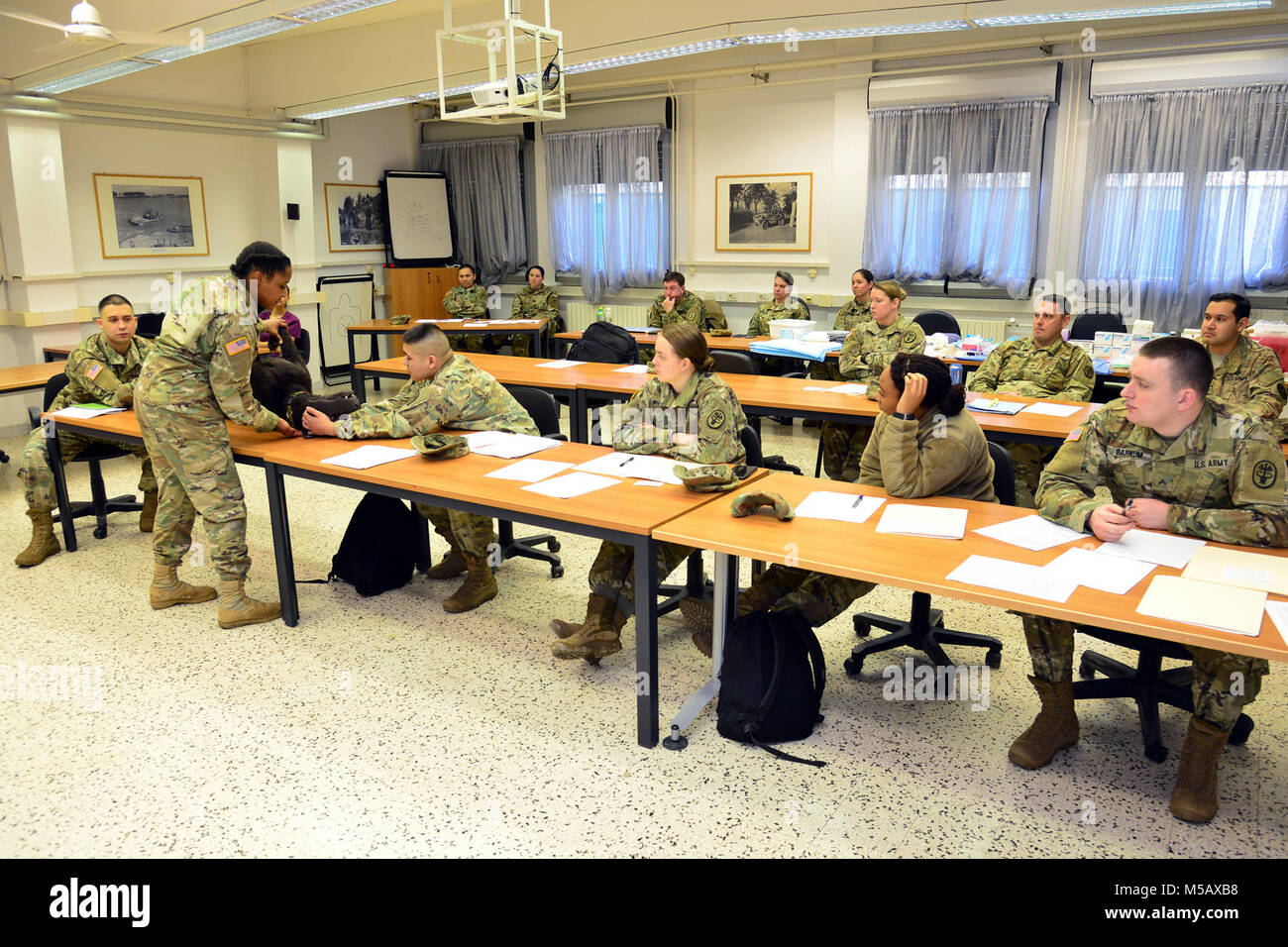 U.S. Army Sgt. Kabryna E. Wordlaw, animal care NCO from Air Force Base ...