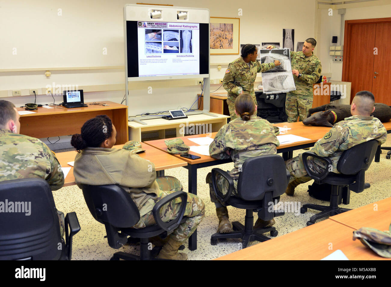 U.S. Army Sgt. Kabryna E. Wordlaw, animal care NCO from Air Force Base ...