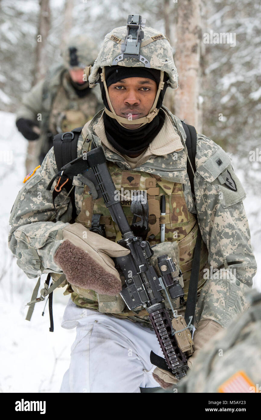 Spc. Moses Ngunjiri, a combat engineer assigned to the 70th Brigade ...