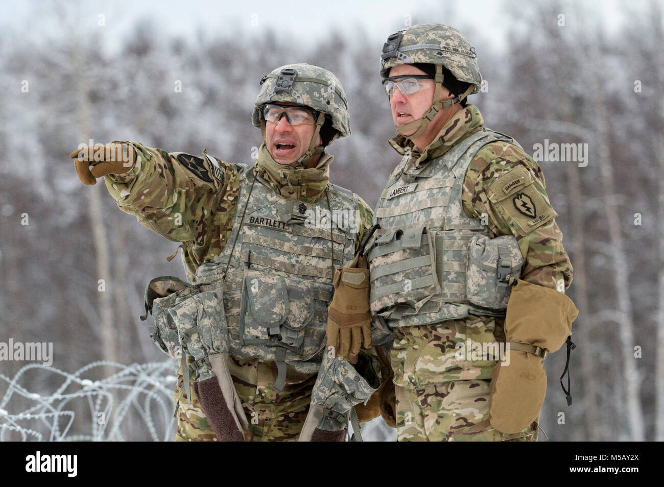 Command Sgt. Maj. Michael O. Bartlett, left, and Col. Kevin Lambert ...