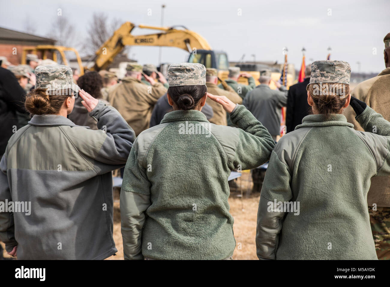 Members of the 188th Wing salute during the ground breaking ceremony of ...