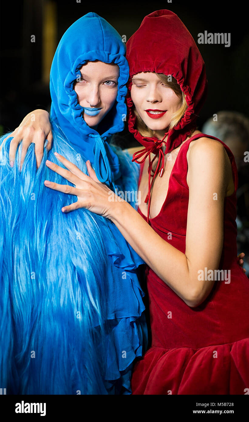 Milan, Italy. 21st Feb, 2018. Models pose for a photo backstage before ...