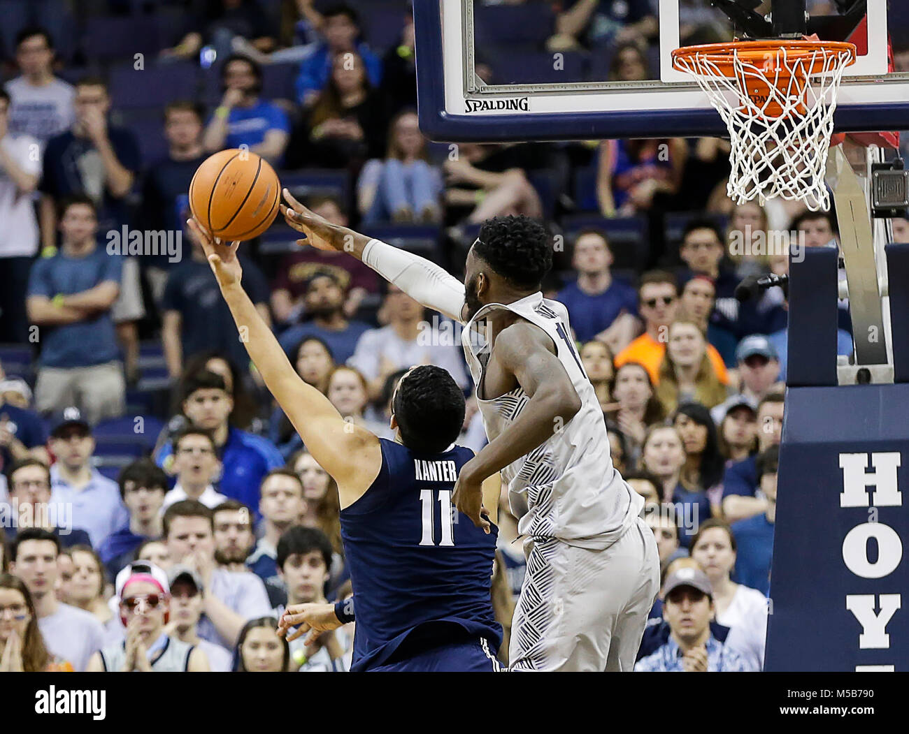 February 21, 2018: Georgetown Hoyas C #15 Jessie Govan tries to tip the ...