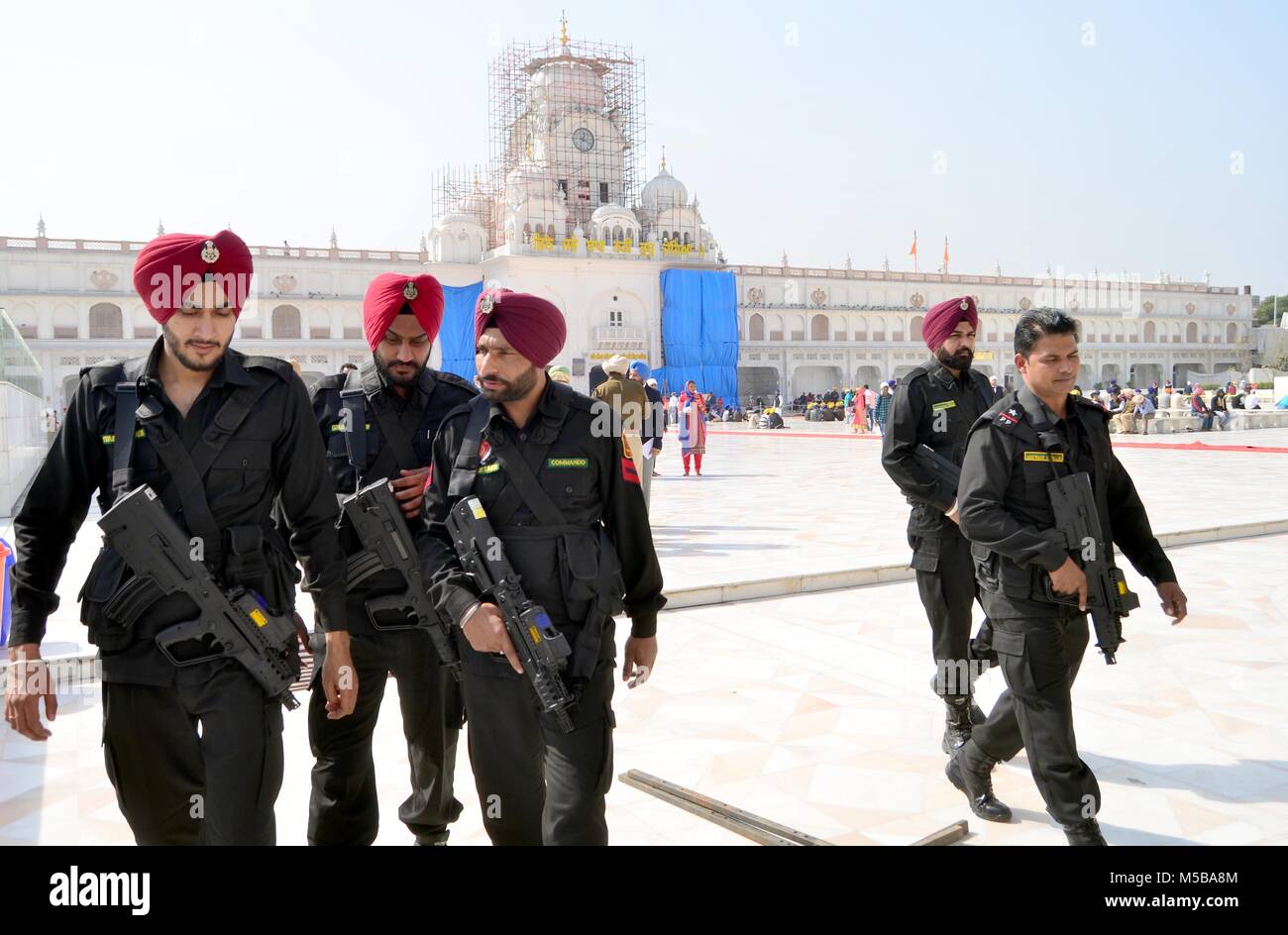 AMRITSAR, INDIA - FEBRUARY 20: : Punjab police Commando stand guard ...