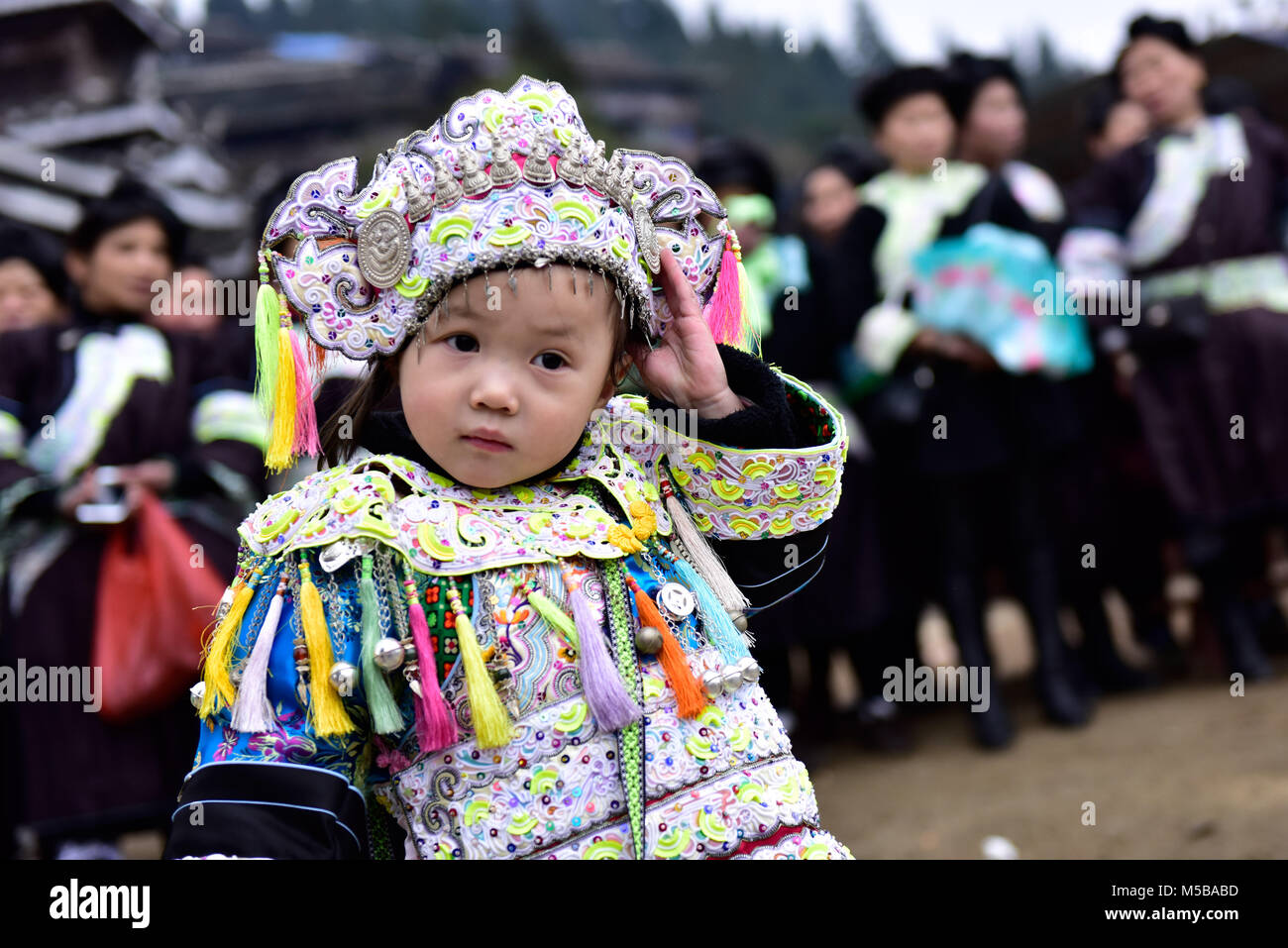 Qiandongnan, China. 21st Feb, 2018. A girl of Dong ethnic group is seen ...