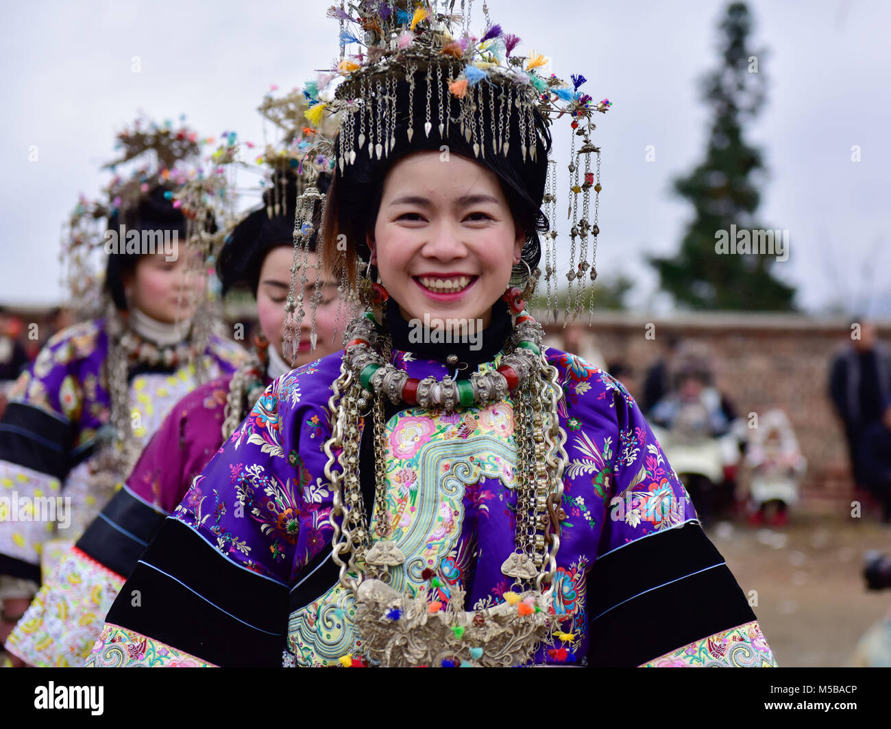 Qiandongnan, China. 21st Feb, 2018. Girls of Dong ethnic group are seen ...