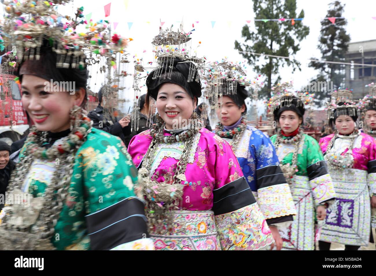 Qiandongnan, China. 21st Feb, 2018. Girls of Dong ethnic group are seen ...