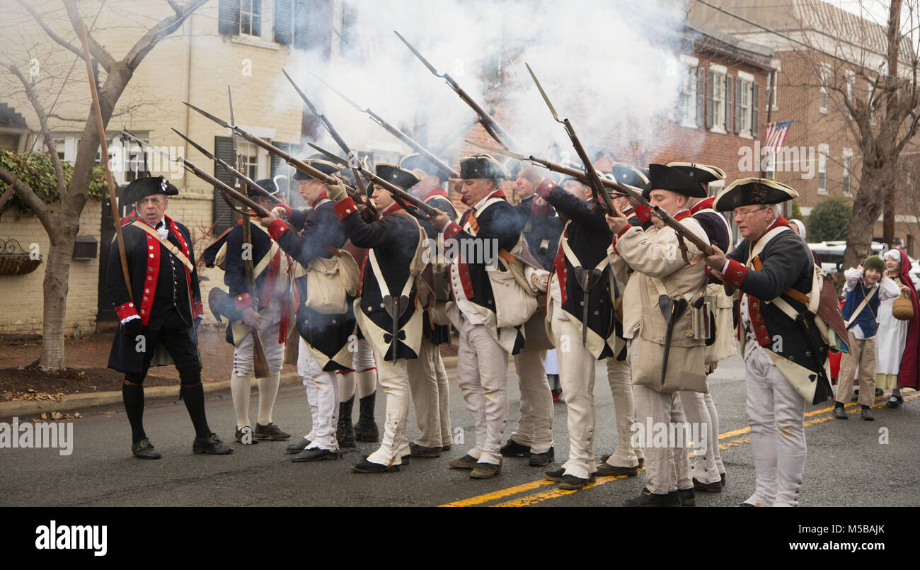 Reenactors of the First Virginia Regiment fire muskets in the George ...