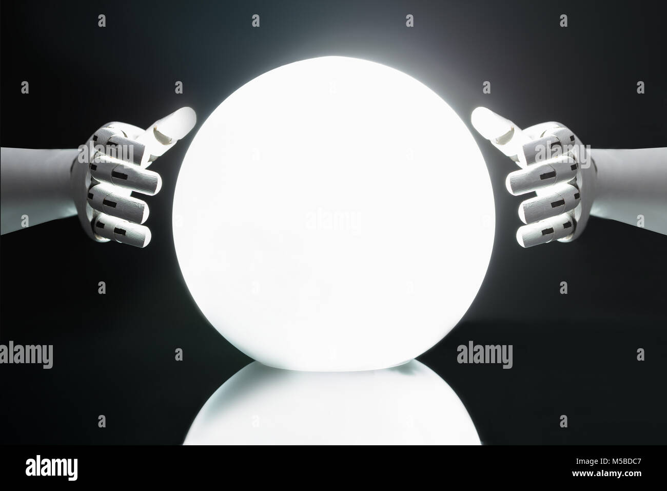 Close-up Of A Robot's Hand Predicting Future With Crystal Ball Stock ...