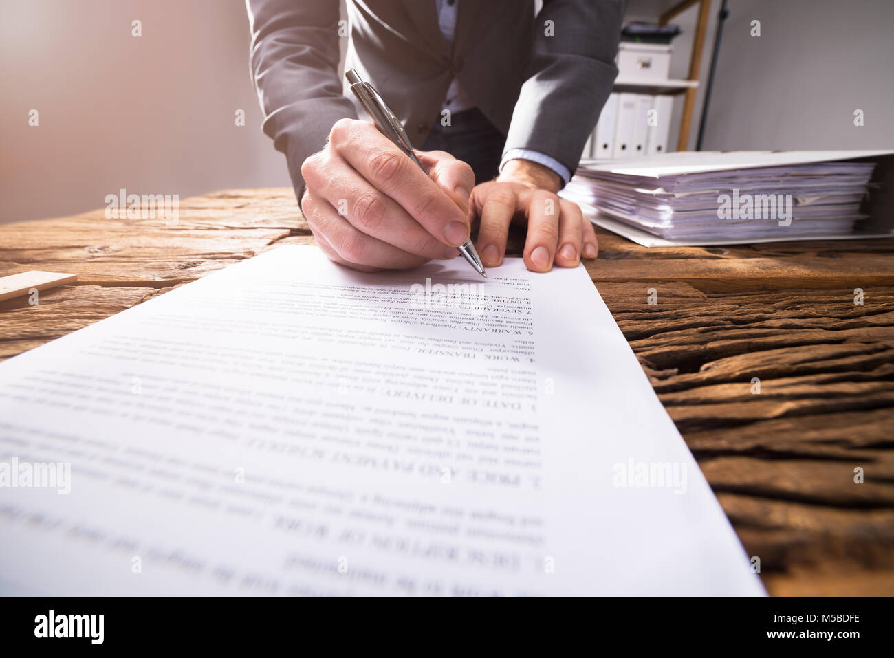 Human hand signing authority document hi-res stock photography and ...