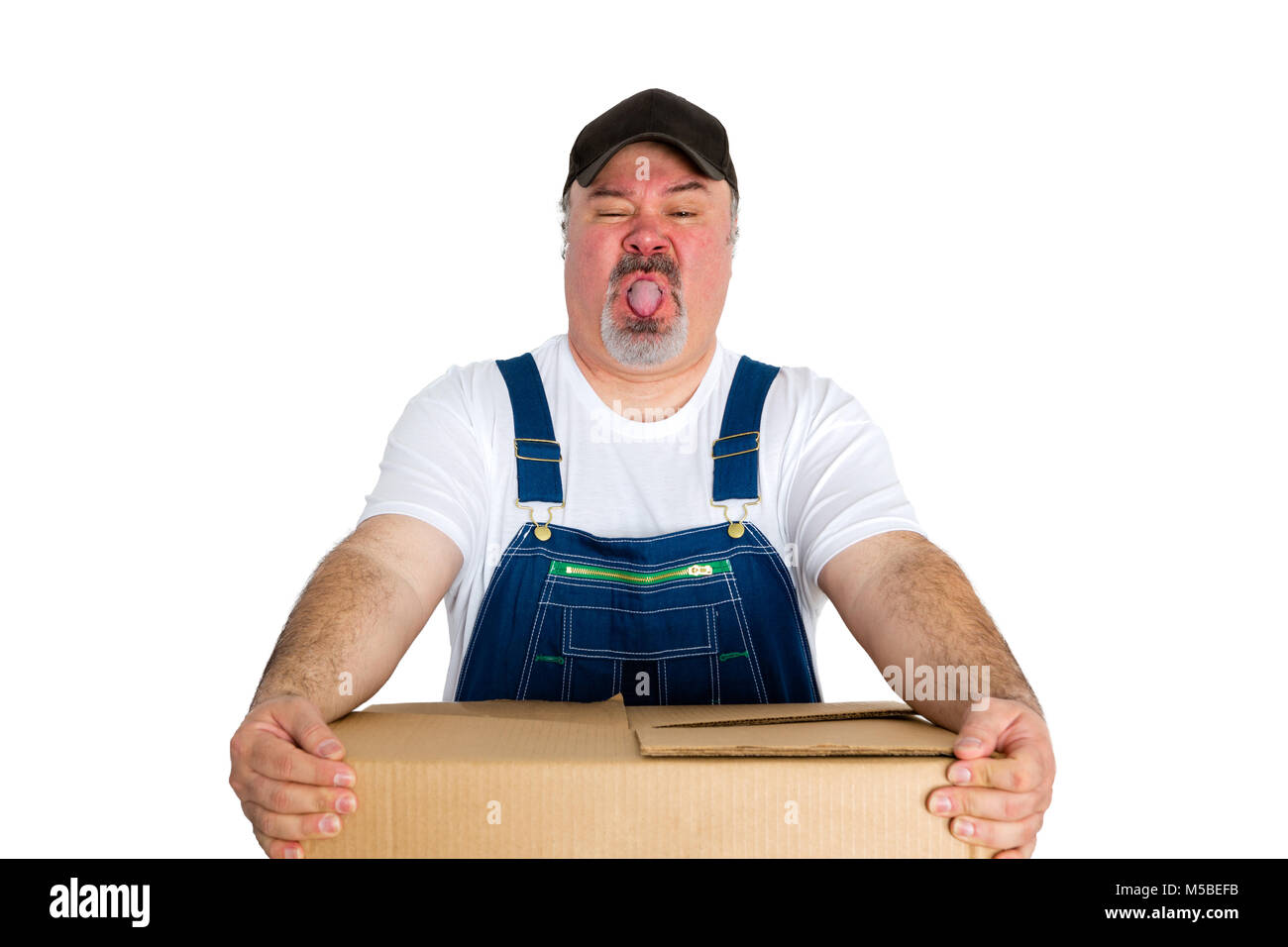 Deliverer carrying heavy cardboard package against white background ...