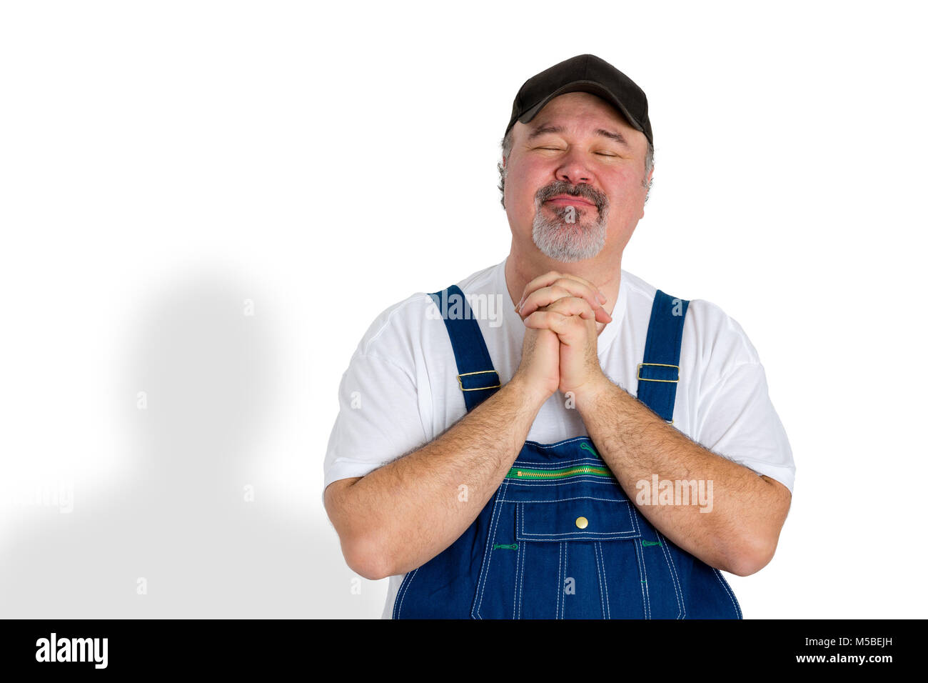 Farmer praying hi-res stock photography and images - Alamy