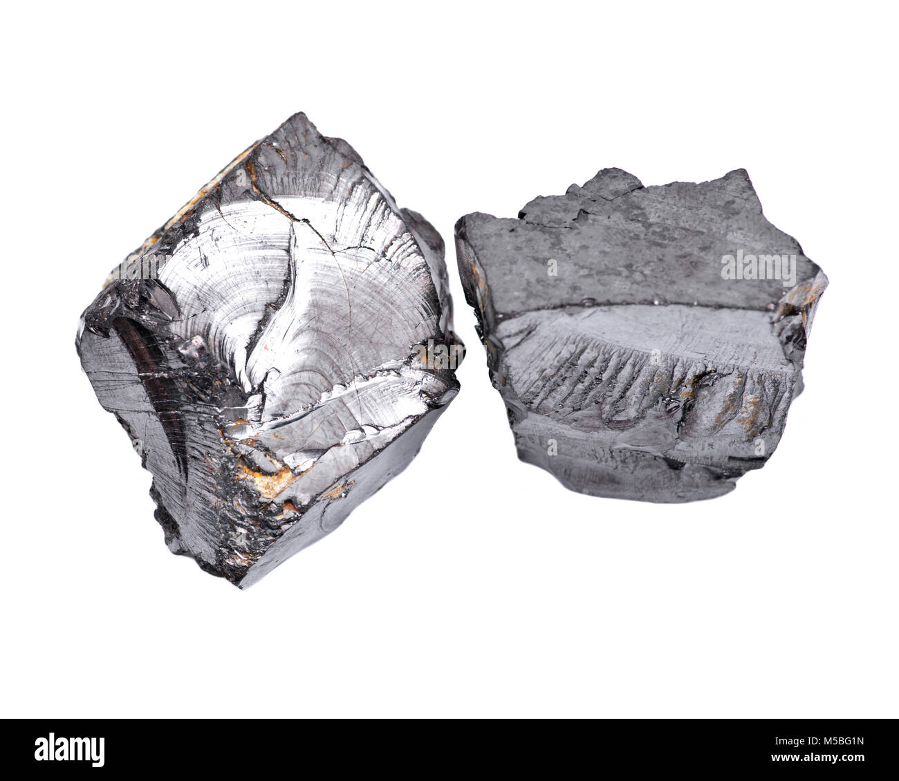 Rough lustrous elite shungite from Russia isolated on white background ...