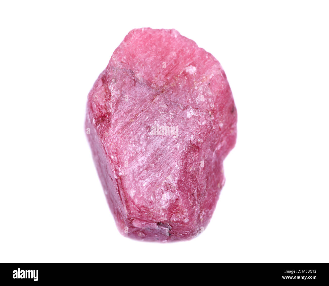 Rough gemmy red Rhodonite from Brazil isolated on white background ...
