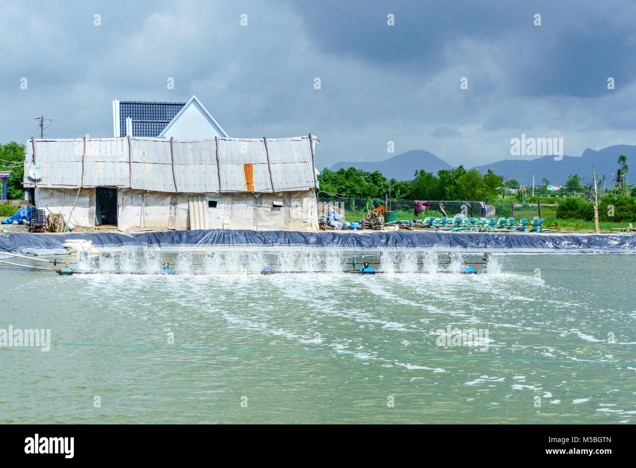 * Aerator turbine wheel oxygen fill ins Into lake water in Shrimp farm ...