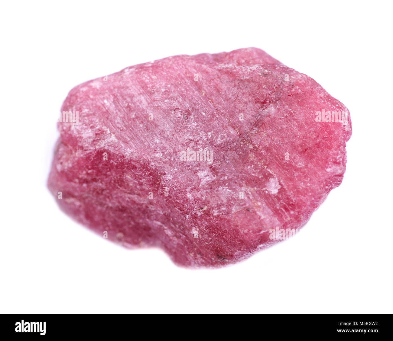 Rough gemmy red Rhodonite from Brazil isolated on white background ...