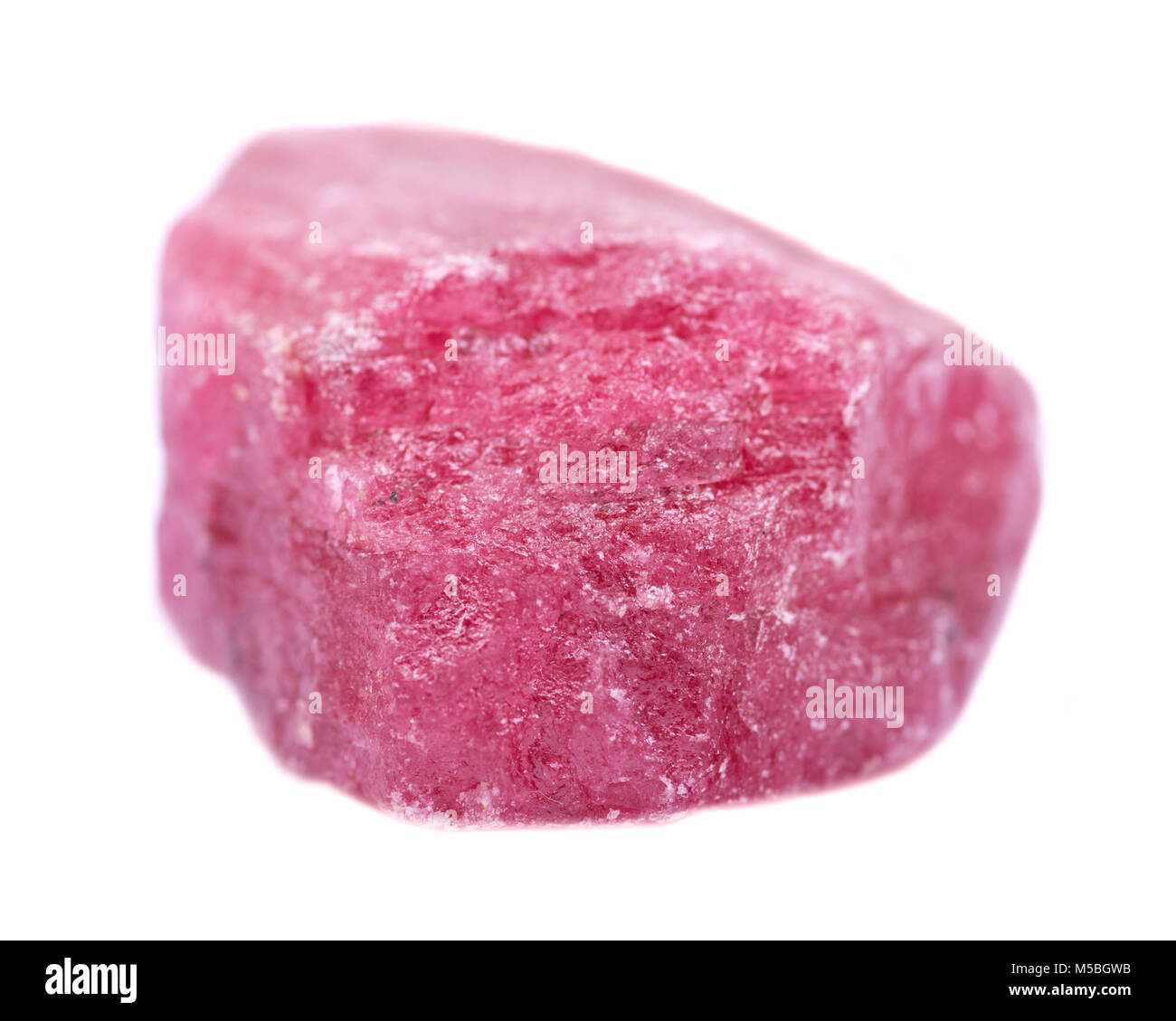 Rough gemmy red Rhodonite from Brazil isolated on white background ...