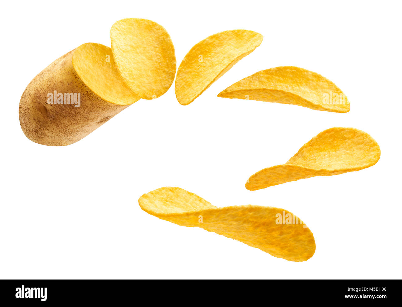 Flying potato slice into potato chips isolated on white background ...