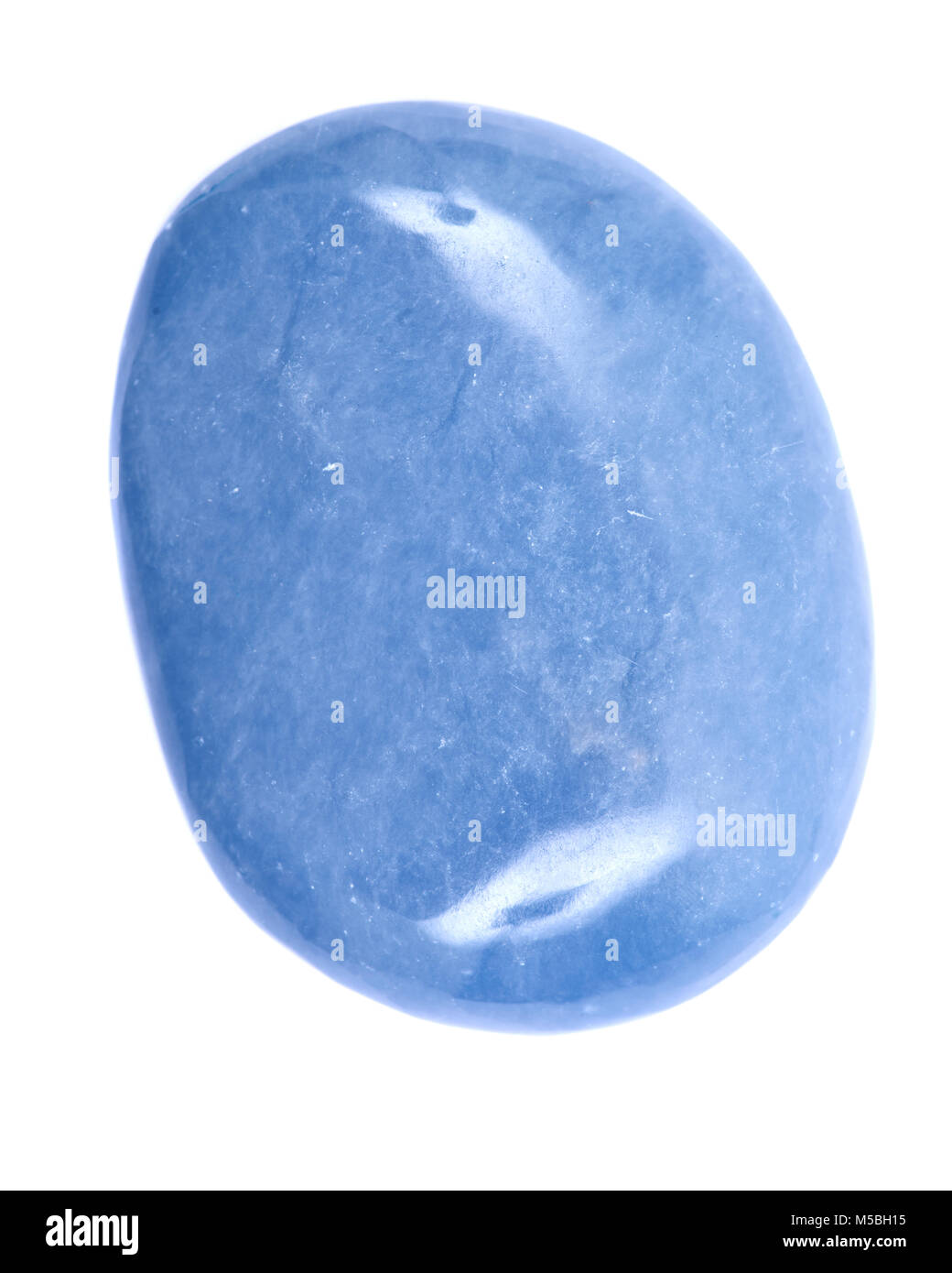 Polished angelite palm stone from Peru isolated on white background ...