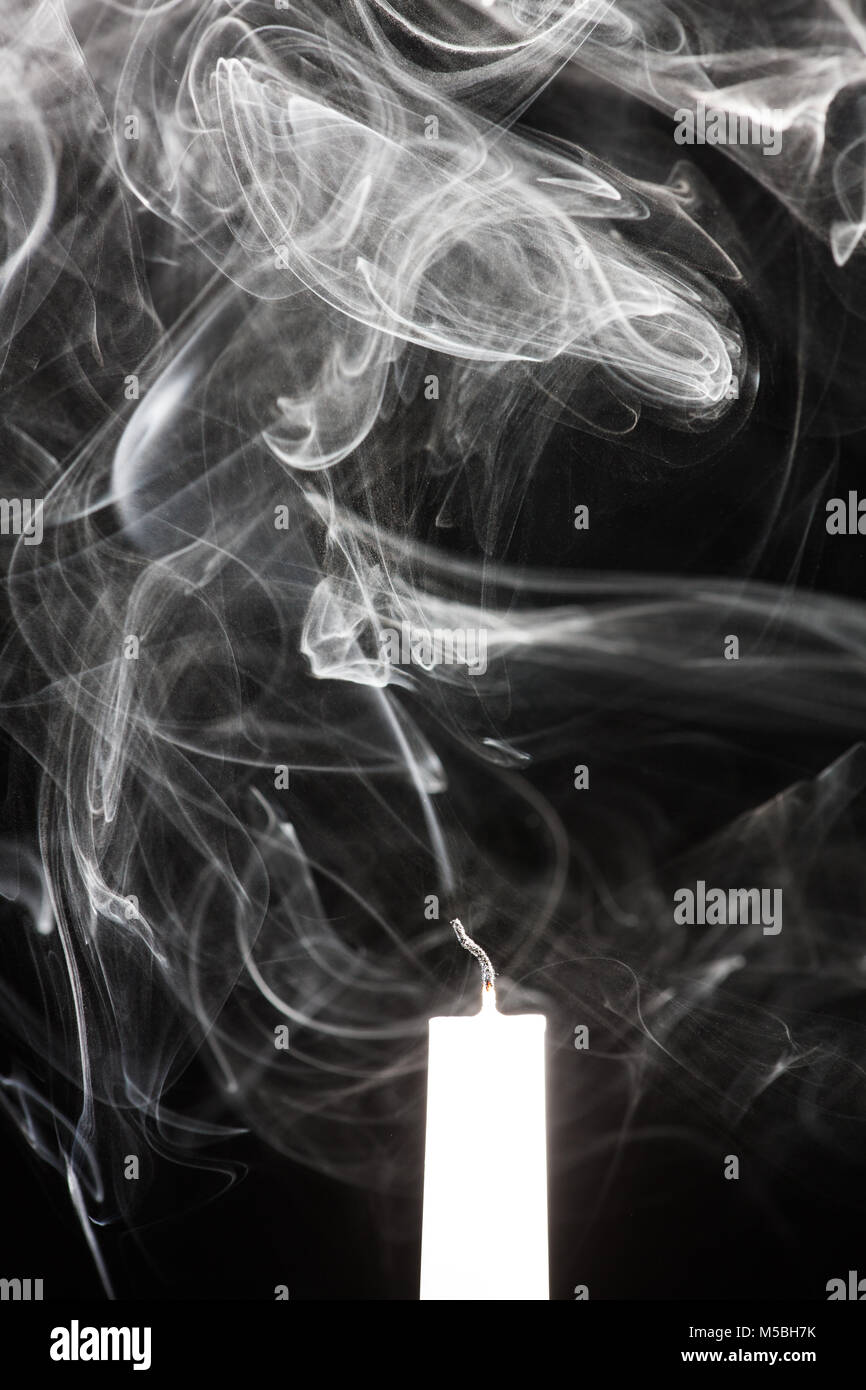 Smoke patterns on black background Stock Photo - Alamy