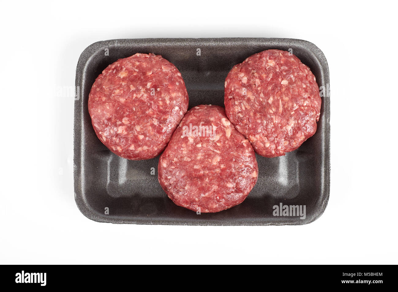 minced meat in plastic package isolated on white background Stock Photo ...