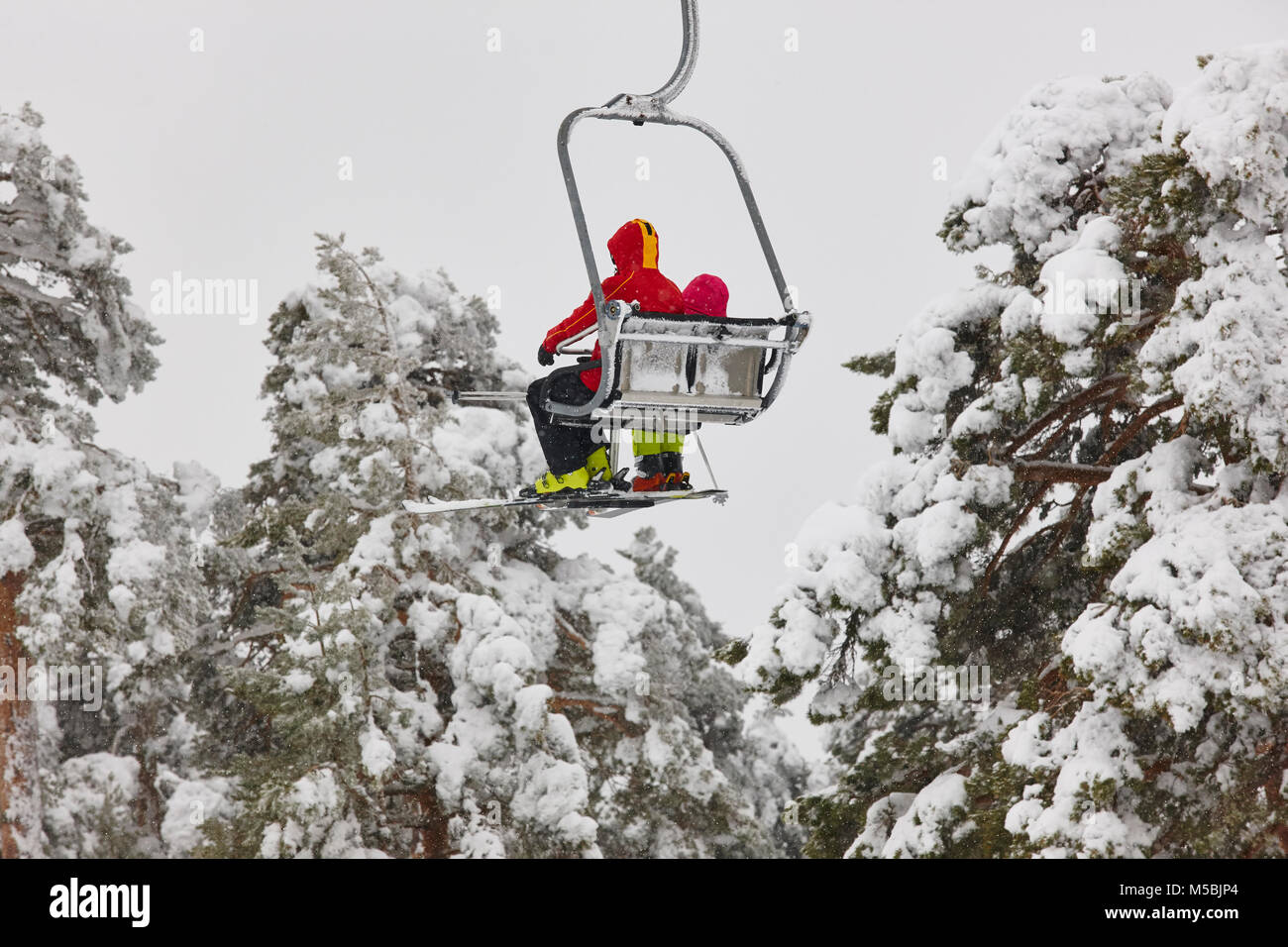 Ski lift and slope on a snow landscape. Winter sport Stock Photo - Alamy