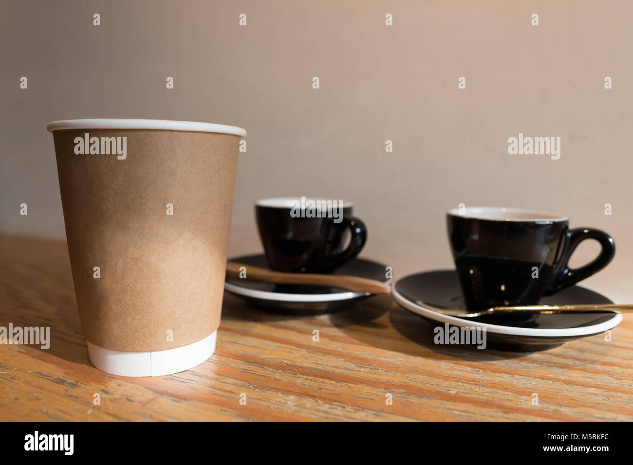 morning sunlight lighting, blank take away coffee paper cup with ...