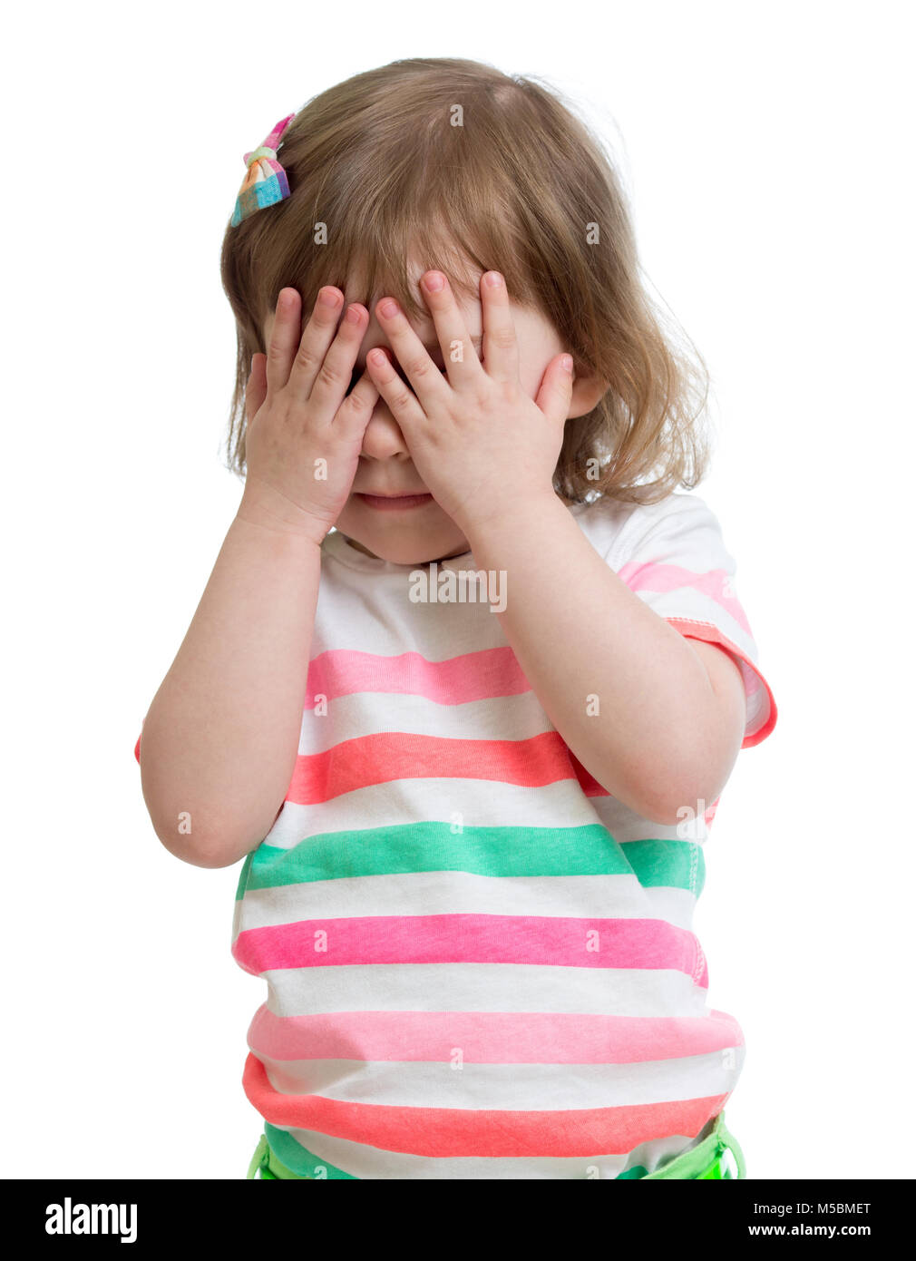 Portrait of a shy little girl close up Stock Photo - Alamy