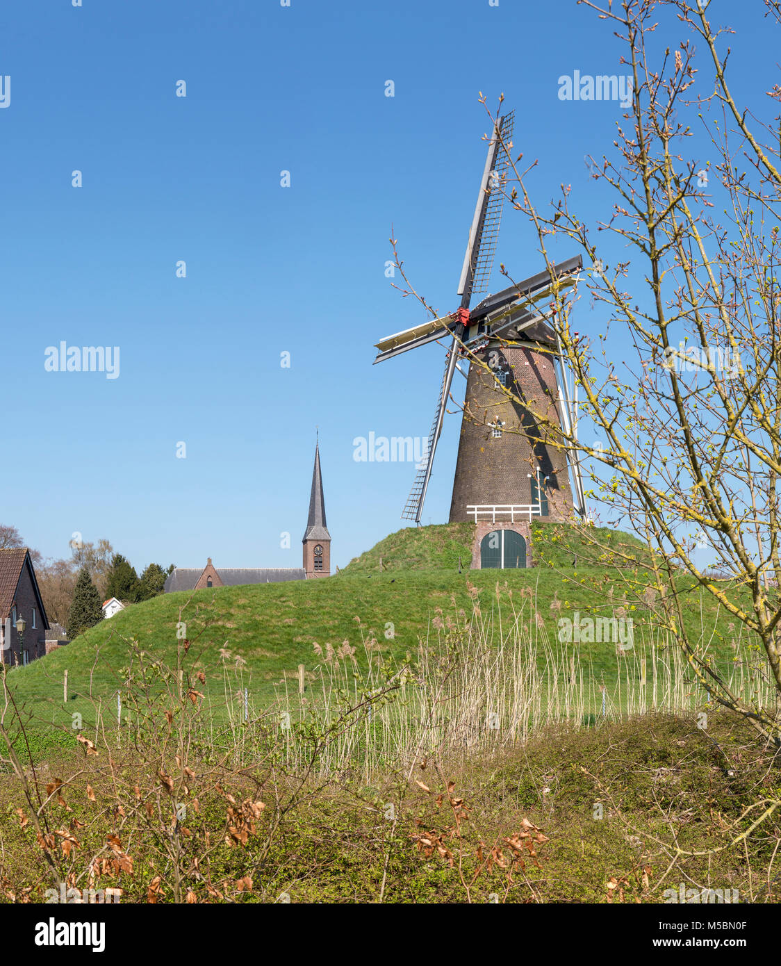 Windmill called The Prince of Orange, church Stock Photo - Alamy