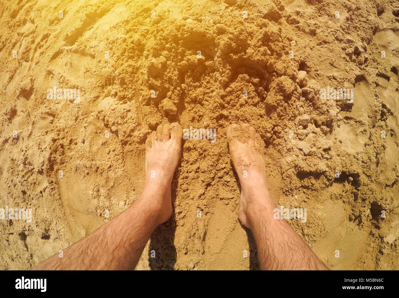Barefoot man hi-res stock photography and images - Alamy