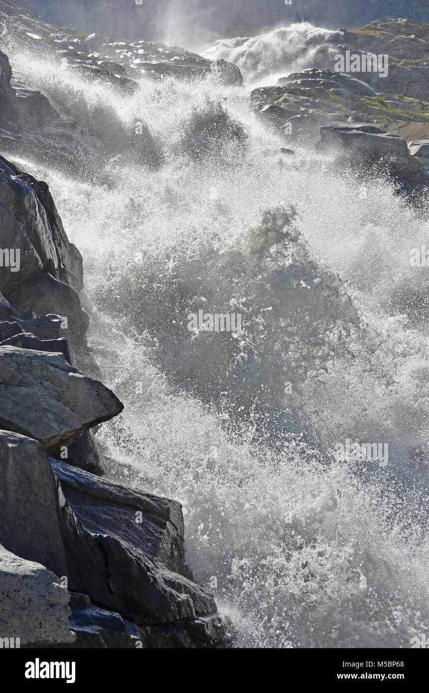 A violent waterfall coming down a cliff Stock Photo - Alamy