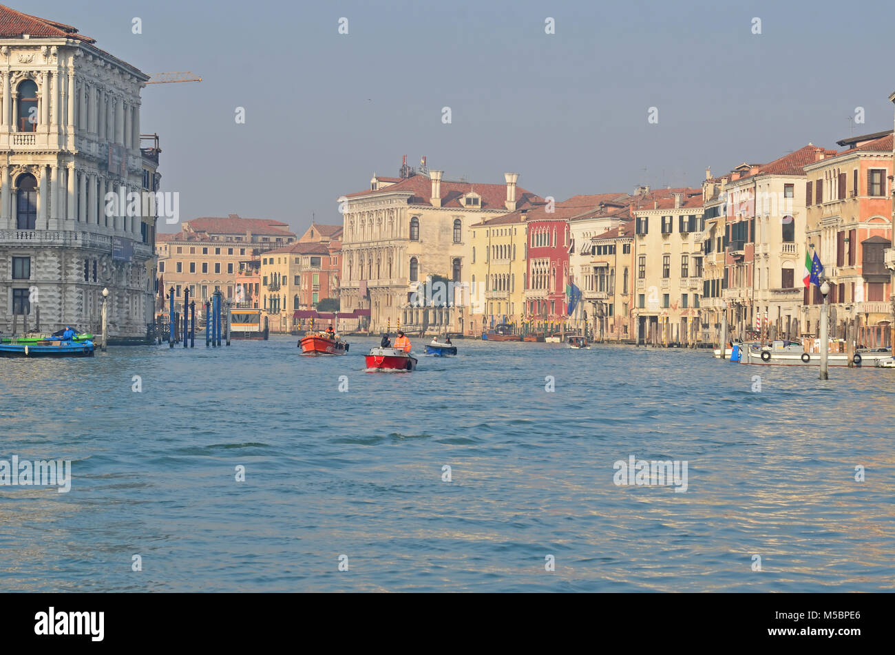 VENICE, ITALY - JANUARY 27: Small boats travel up and down the Grand ...