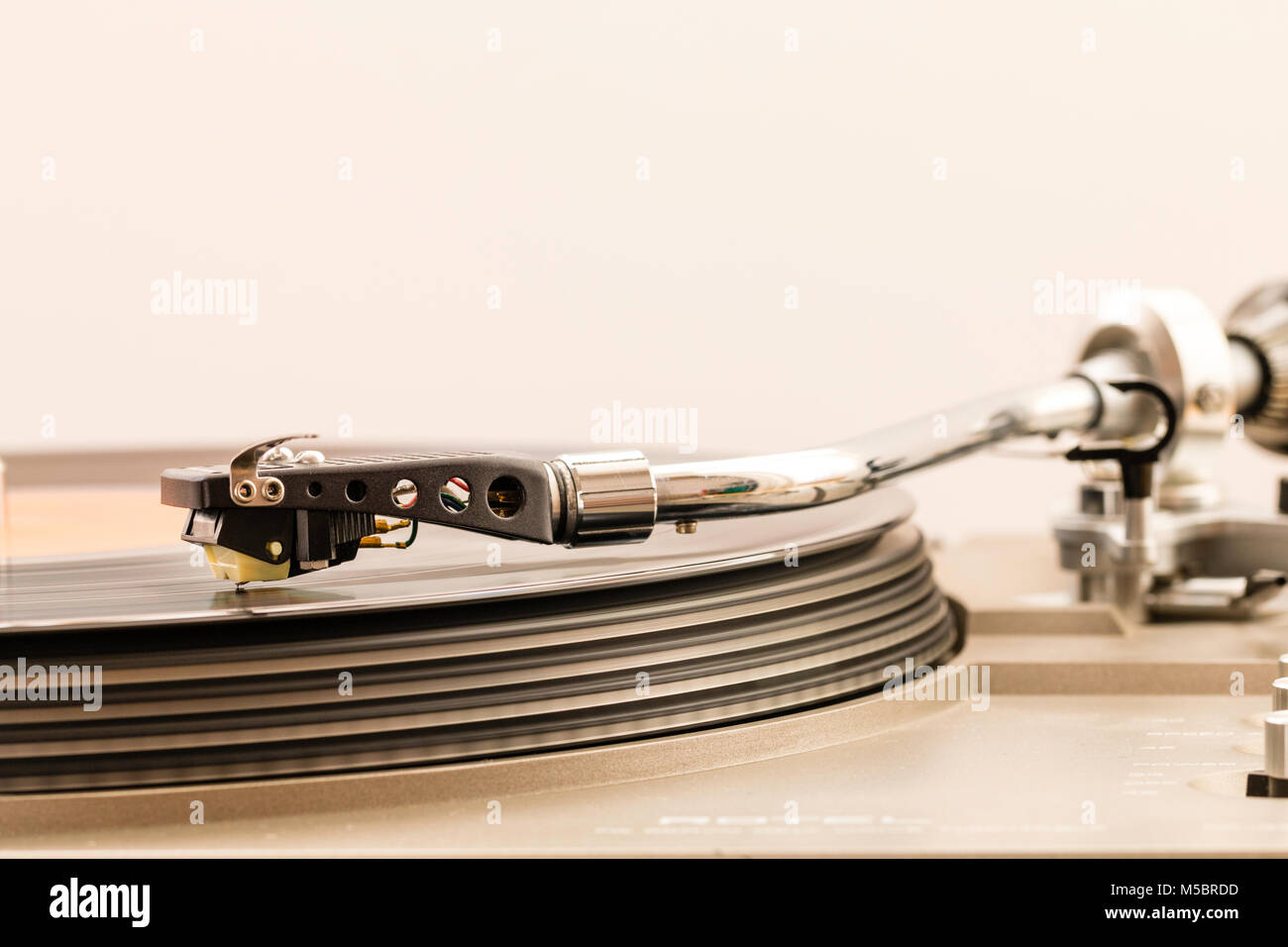 Record player deck, turntable, with 33 rpm, LP, record being played ...