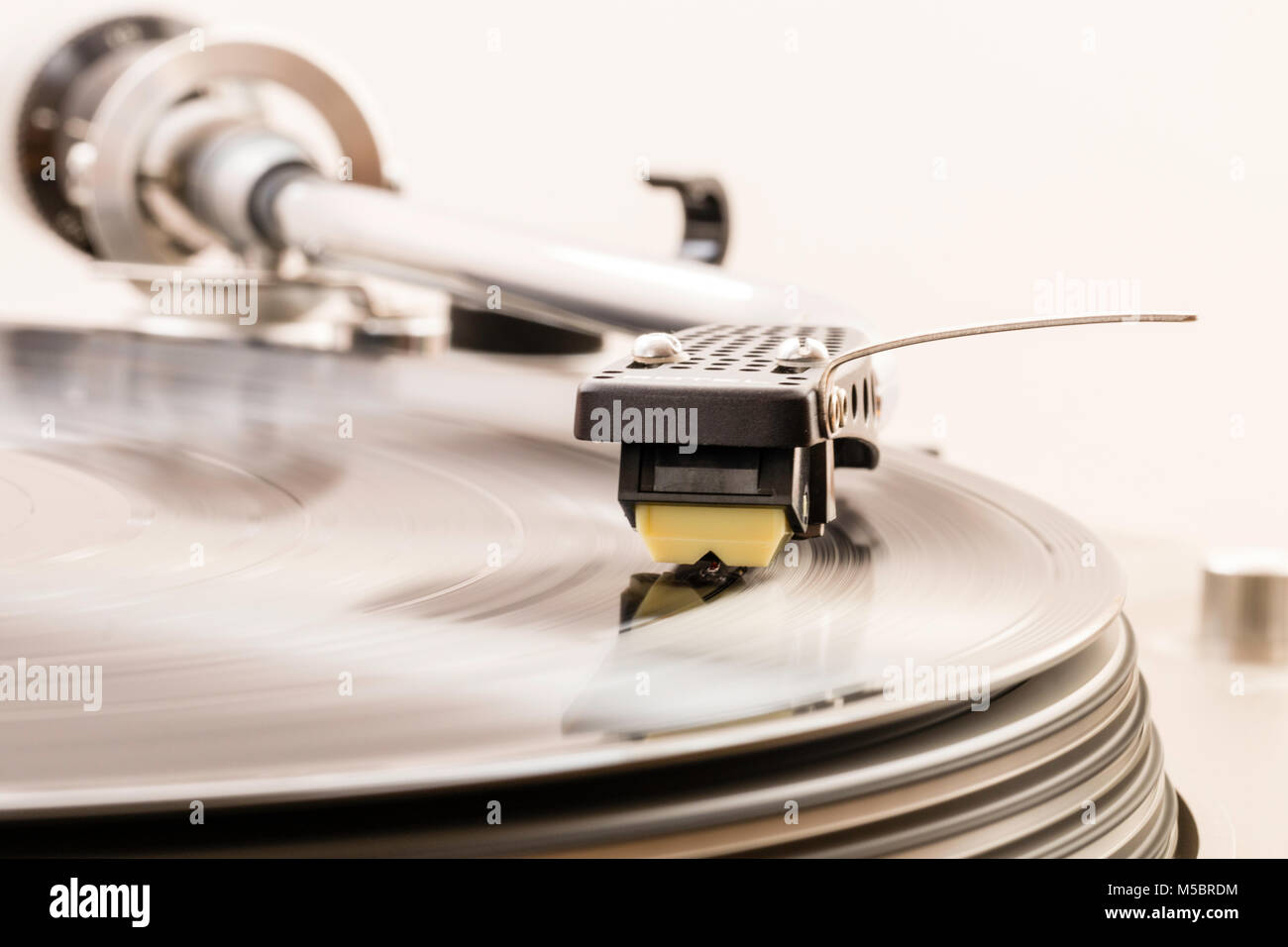 Record player deck, turntable, with 33 rpm, LP, record being played ...