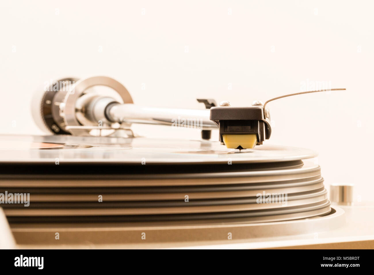 Record player deck, turntable, with 33 rpm, LP, record being played ...