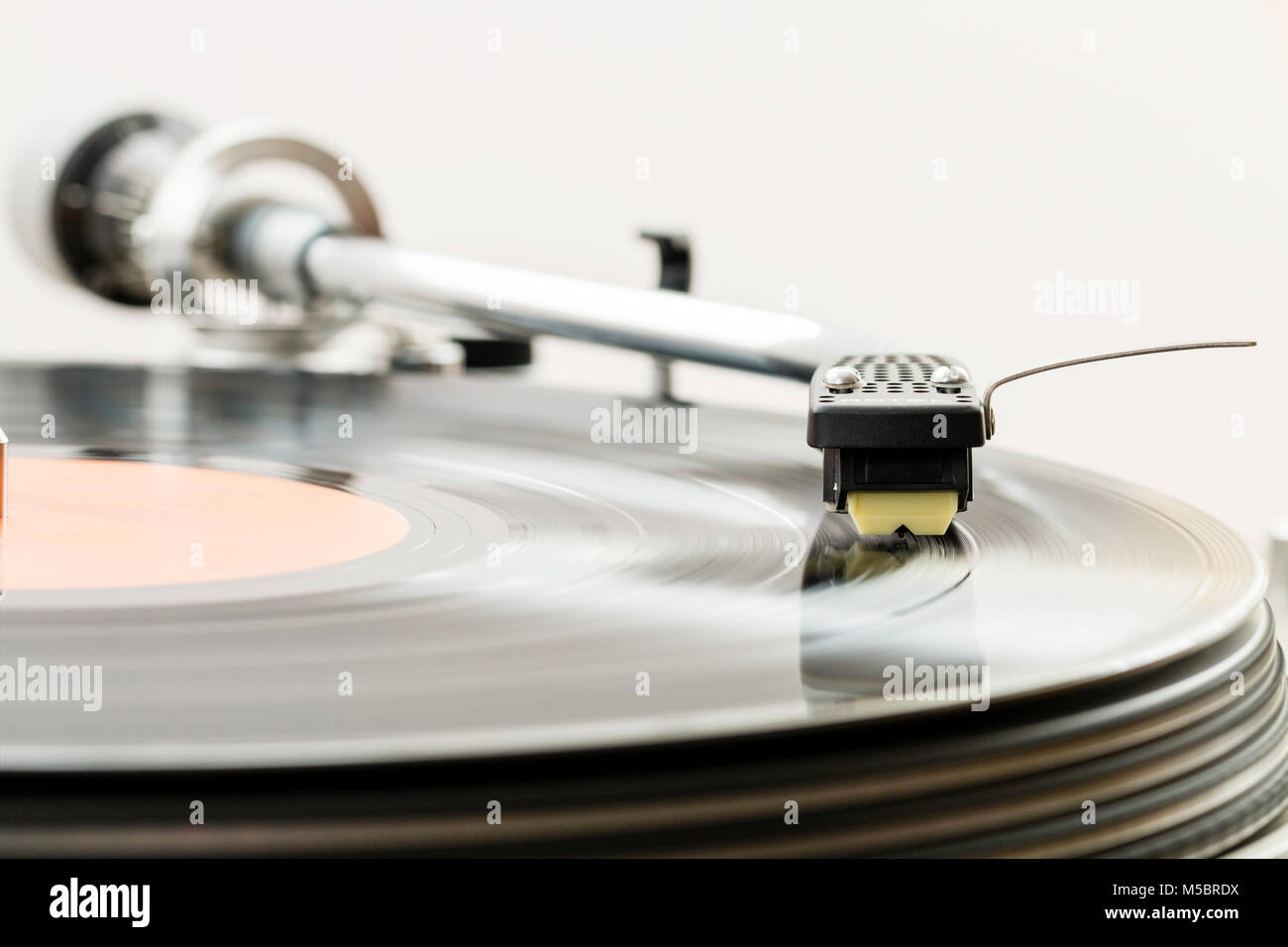 Record player deck, turntable, with 33 rpm, LP, record being played ...