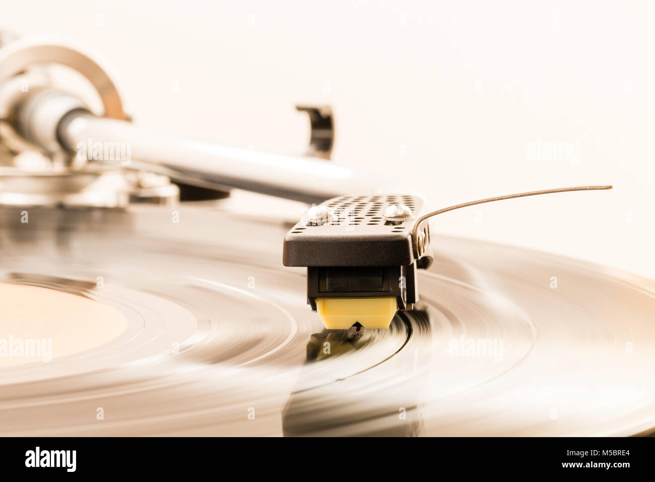 Record player deck, turntable, with 33 rpm, LP, record being played ...