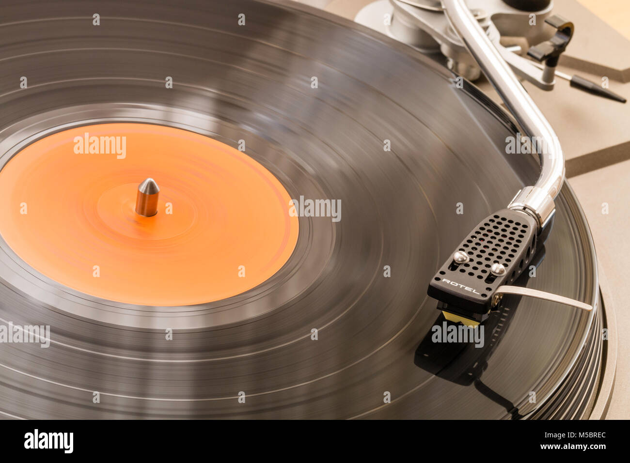 Record player deck, turntable, with 33 rpm, LP, record being played ...