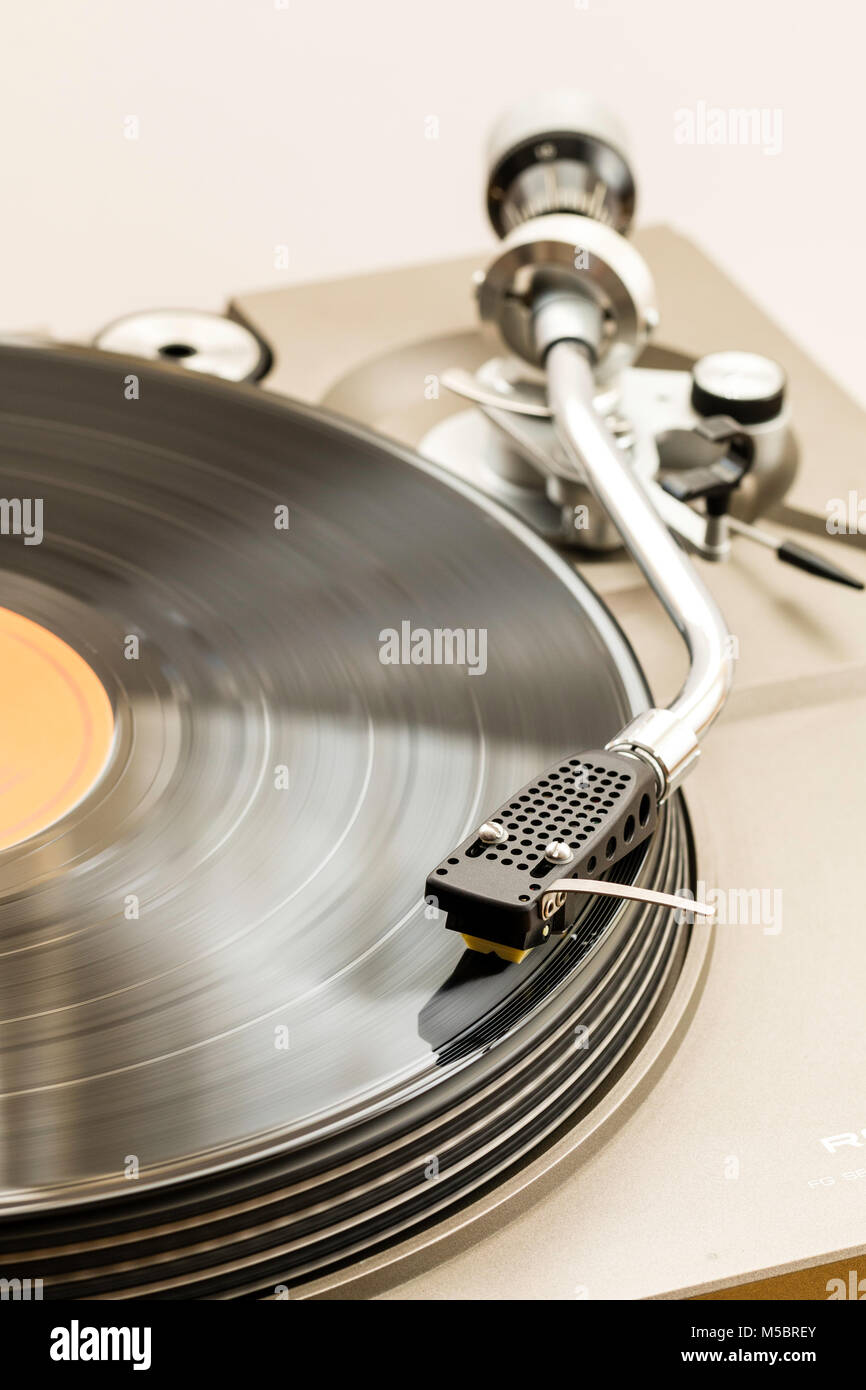 Record player deck, turntable, with 33 rpm, LP, record being played ...