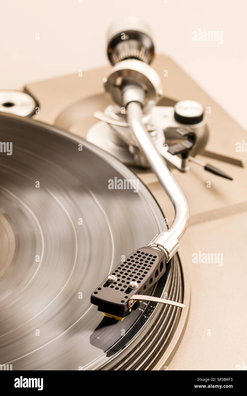 Record player deck, turntable, with 33 rpm, LP, record being played ...
