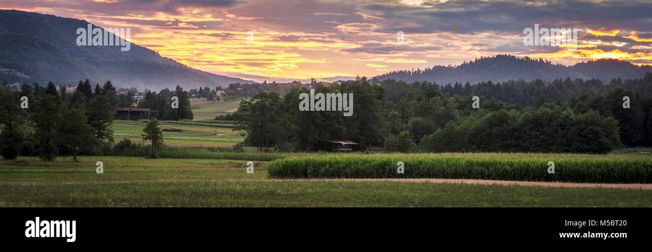 Countryside with sunset Stock Photo - Alamy