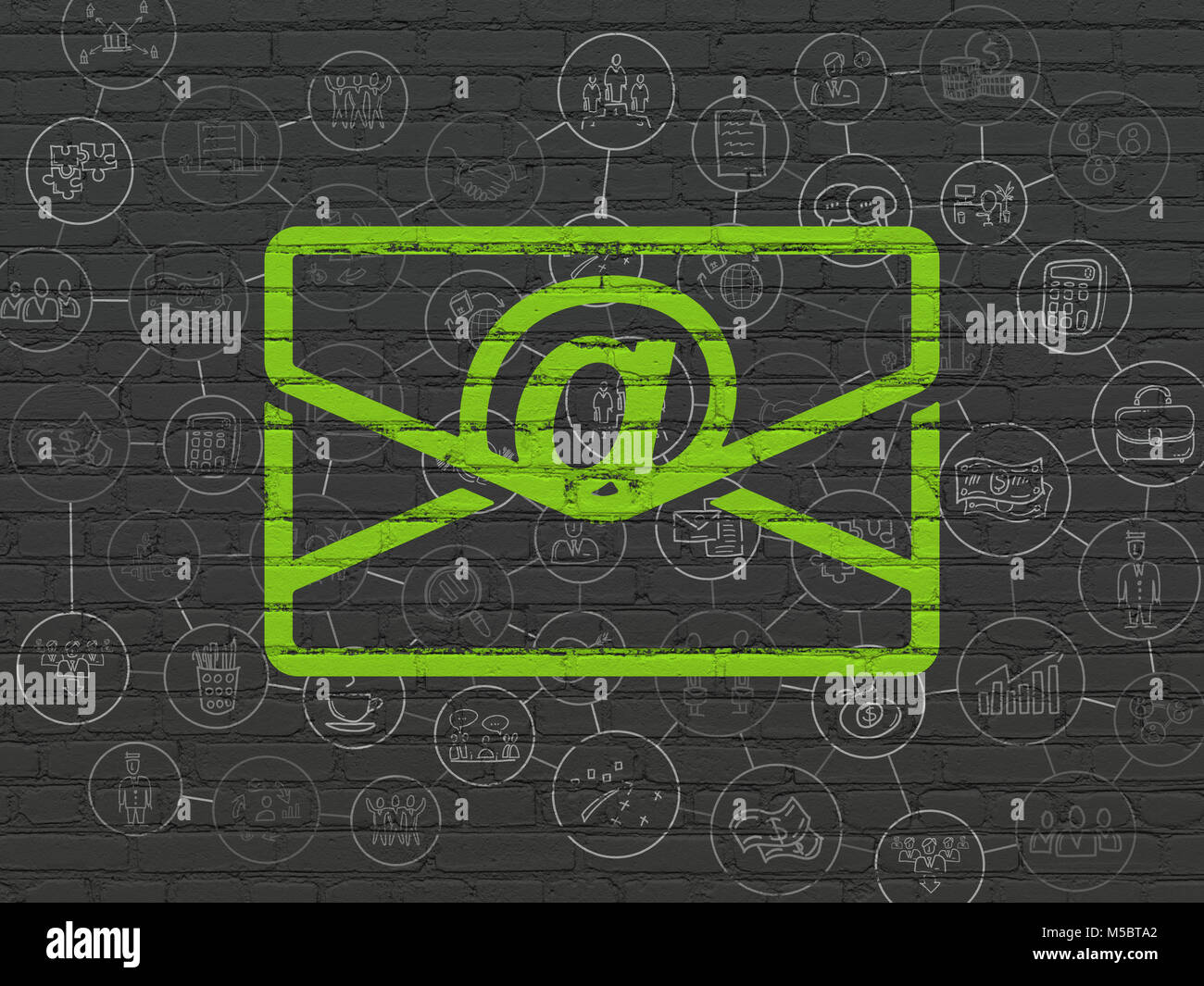 Finance concept: Email on wall background Stock Photo - Alamy