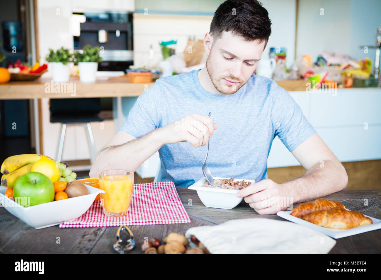 young man breakfast Stock Photo - Alamy