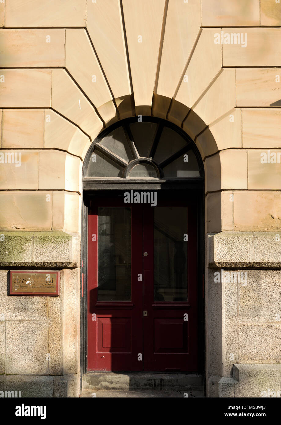 Stone arch door surround, Channelled rustication, ashlar and fanlight ...