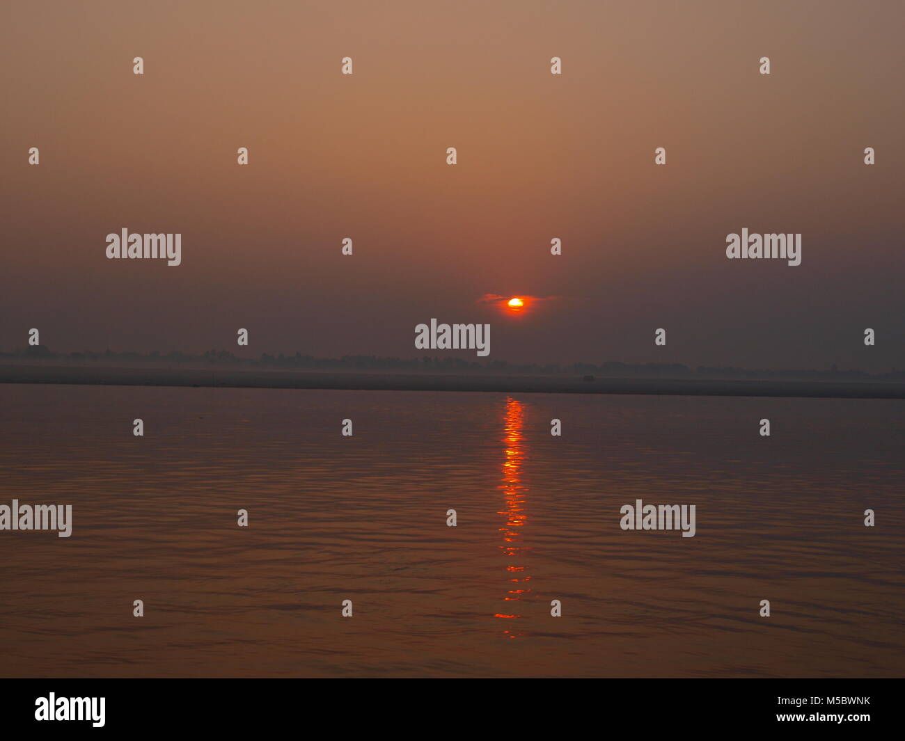Sunset in Varanasi Stock Photo - Alamy