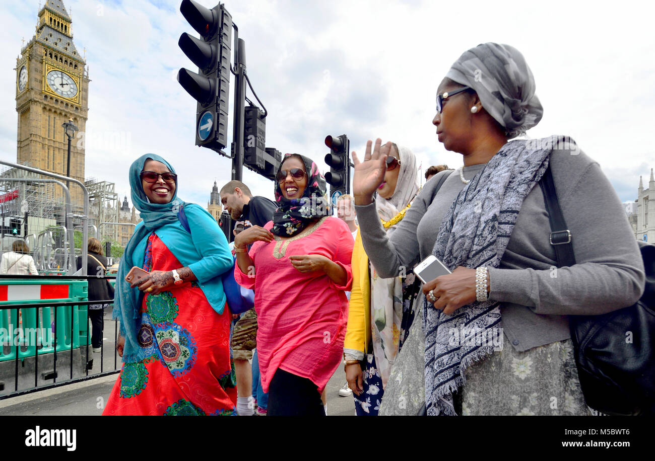 London, England, UK. Group of muslim women talking in Parliament Square ...