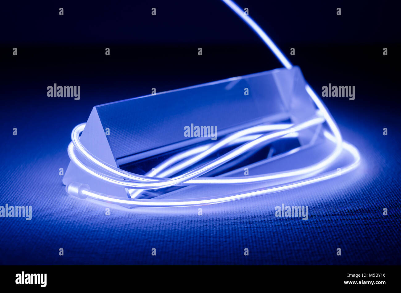 Prism with purple neon lighting hi-res stock photography and images - Alamy