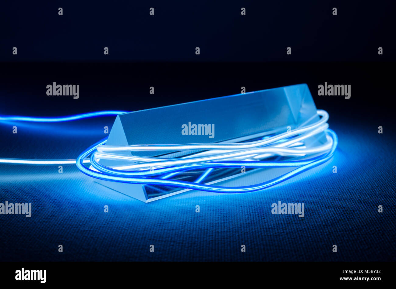 A Studio Still-life Photograph of a Triangular Glass Prism with ...