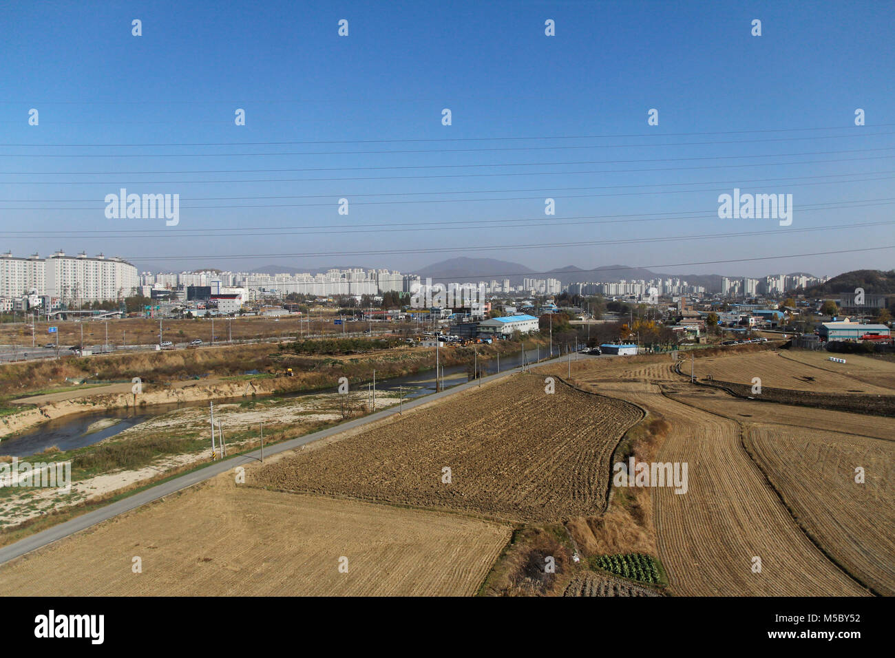 Aerial view of South Korea countryside and crop field in autumn through ...